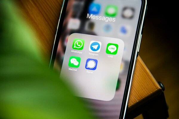 Smartphone With Different Messaging Apps On The Screen